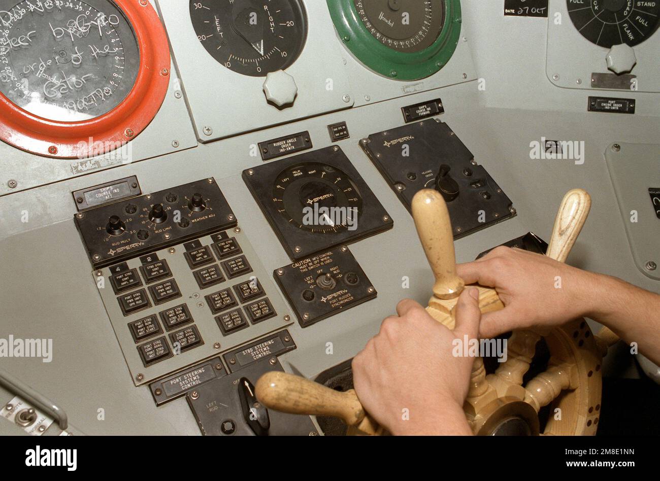 A close-up view of some of the gauges and switches at the helmsman's ...