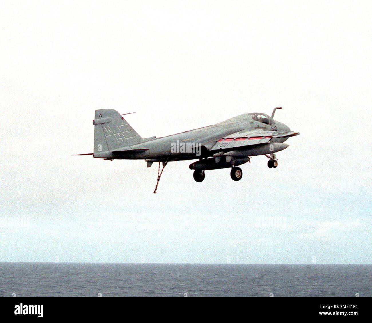 An Attack Squadron 95 (VA-95) A-6E Intruder aircraft gains altitude ...