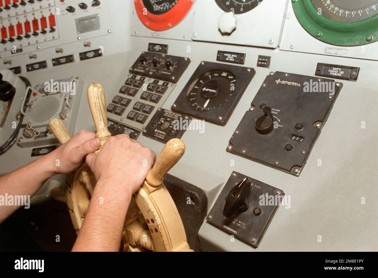 A close-up view of some of the gauges and switches at the helmsman's ...