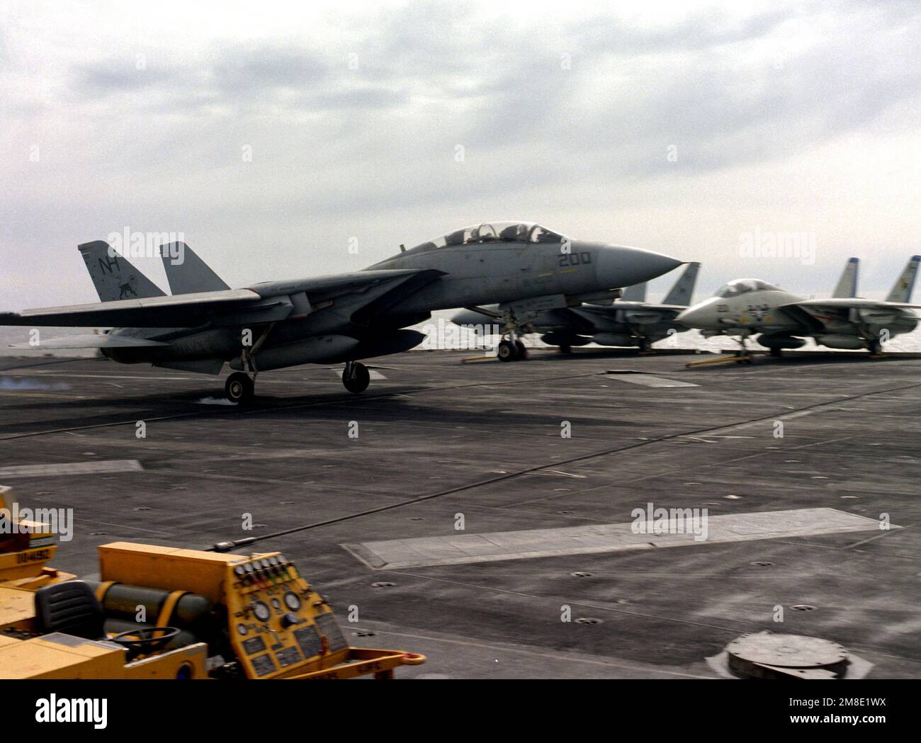 A Fighter Squadron 213 (VF-213) F-14A Tomcat aircraft catches the ...