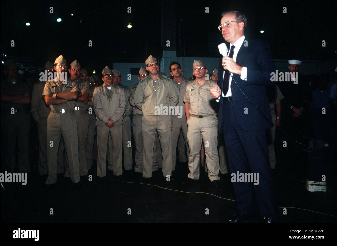 Secretary of the Navy H. Lawrence Garrett III, right, speaks to some of ...