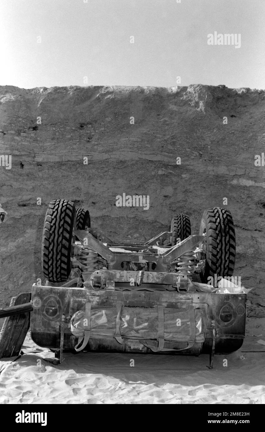 Rear end of an overturned M998 High-Mobility Multipurpose Wheeled ...