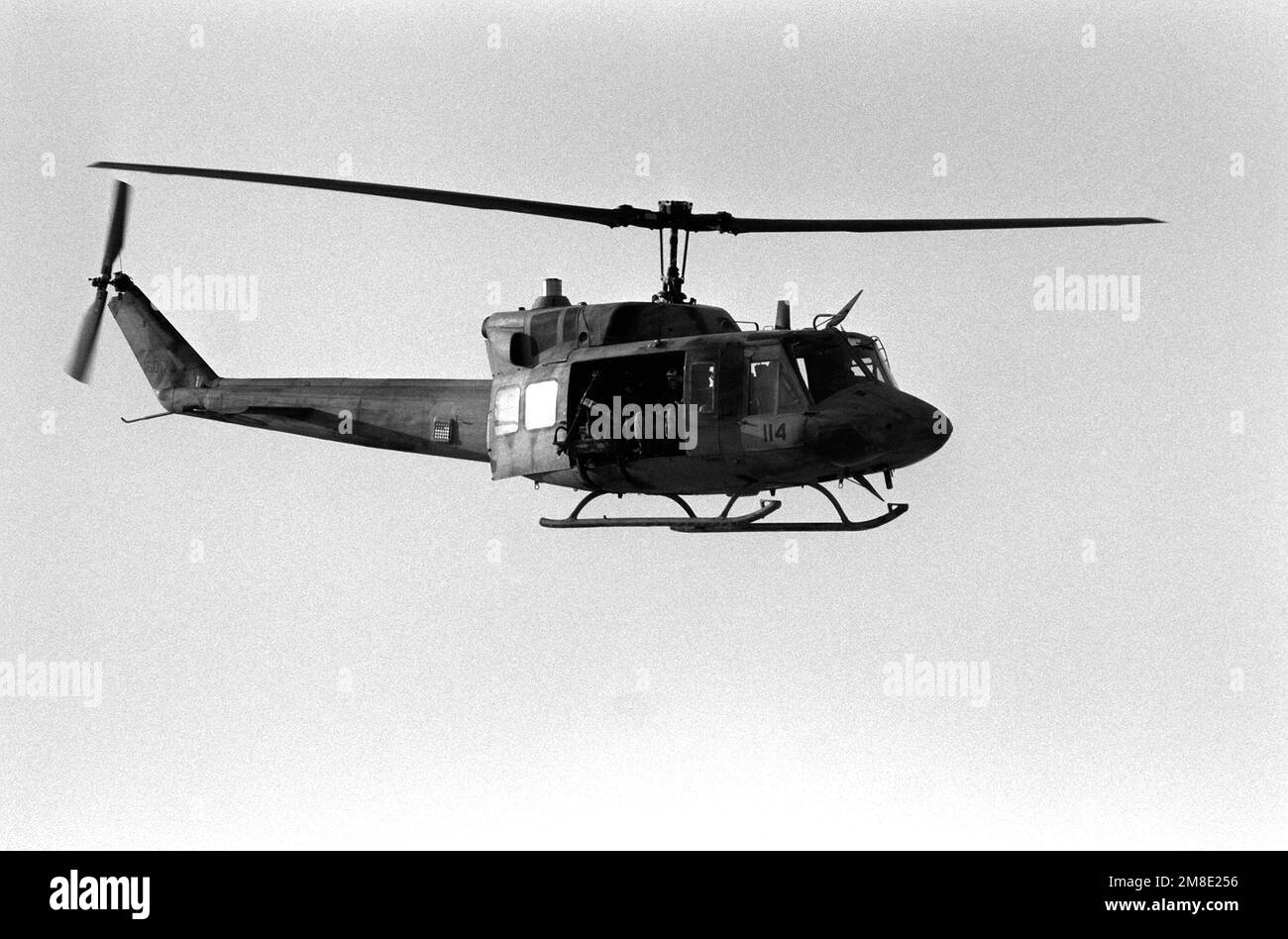 A right side view of a Marine Corps UH-1N Iroquois helicopter in flight ...