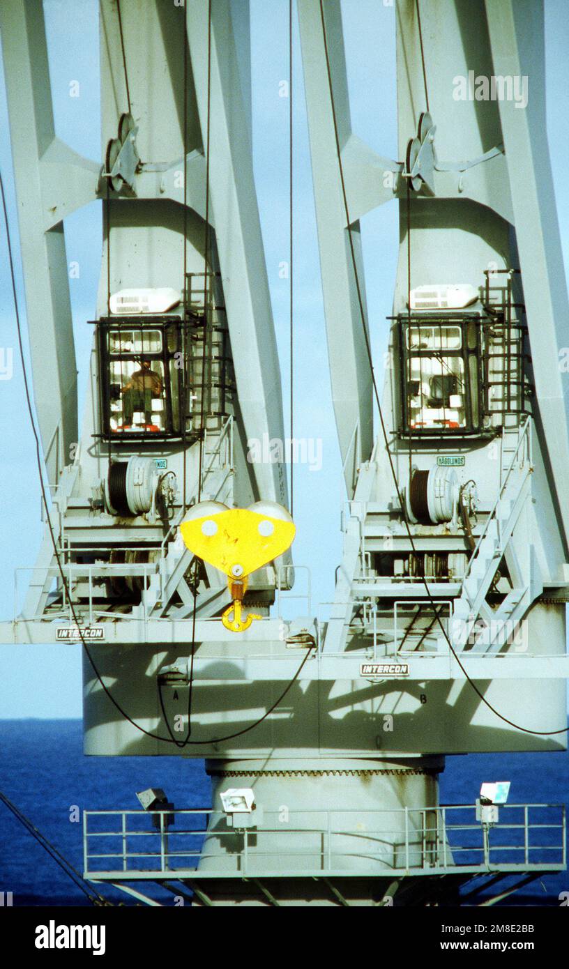 A soldier from the 155th Transportation Company operates one of the ...