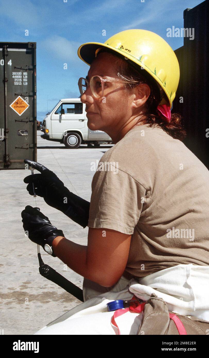 Dolores V. Hernandez, a civilian air managerial technician, prepares to ...