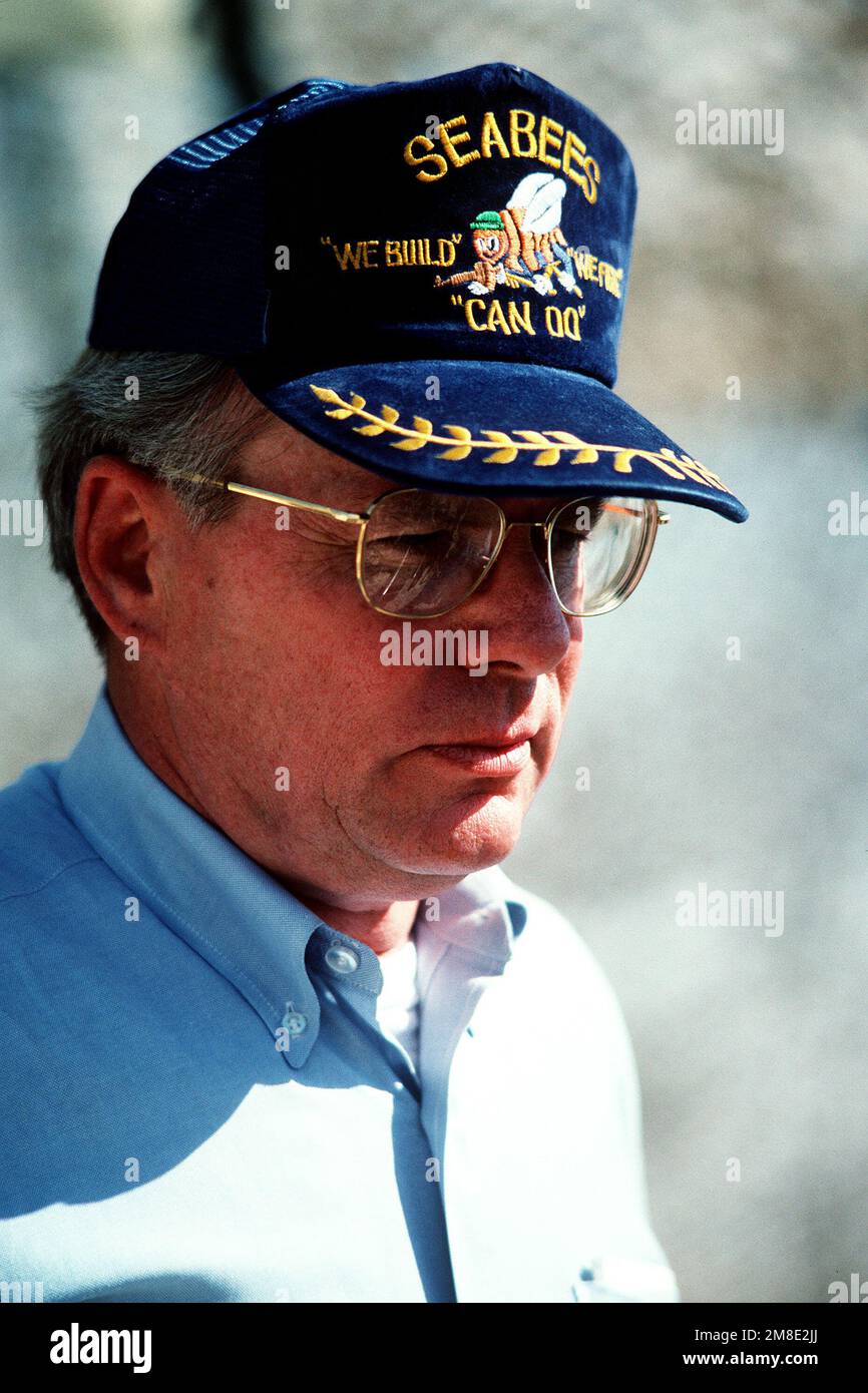 Secretary of the Navy H. Lawrence Garrett III sports a construction ...