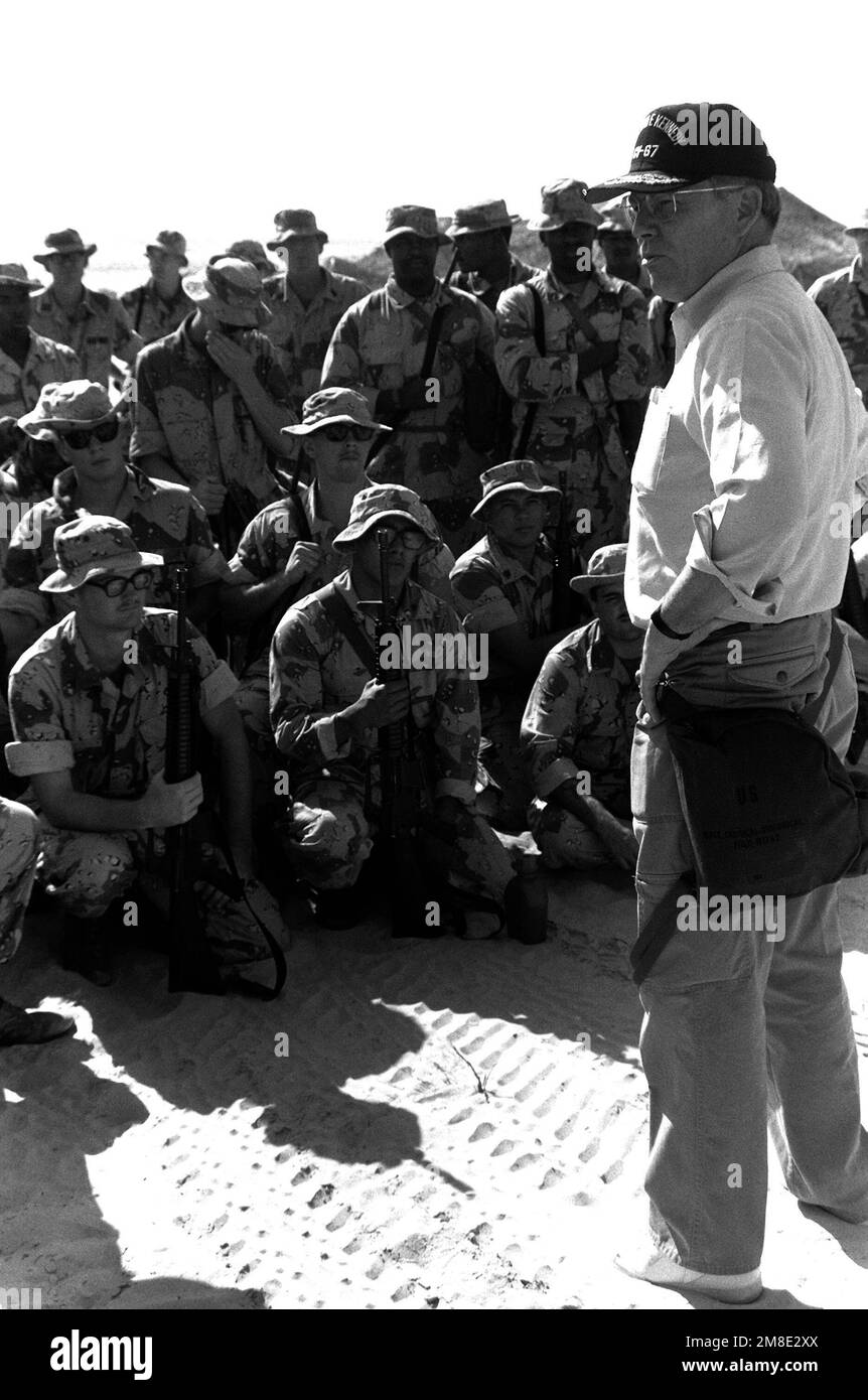 Secretary of the Navy H. Lawrence Garrett III speaks to a group of ...