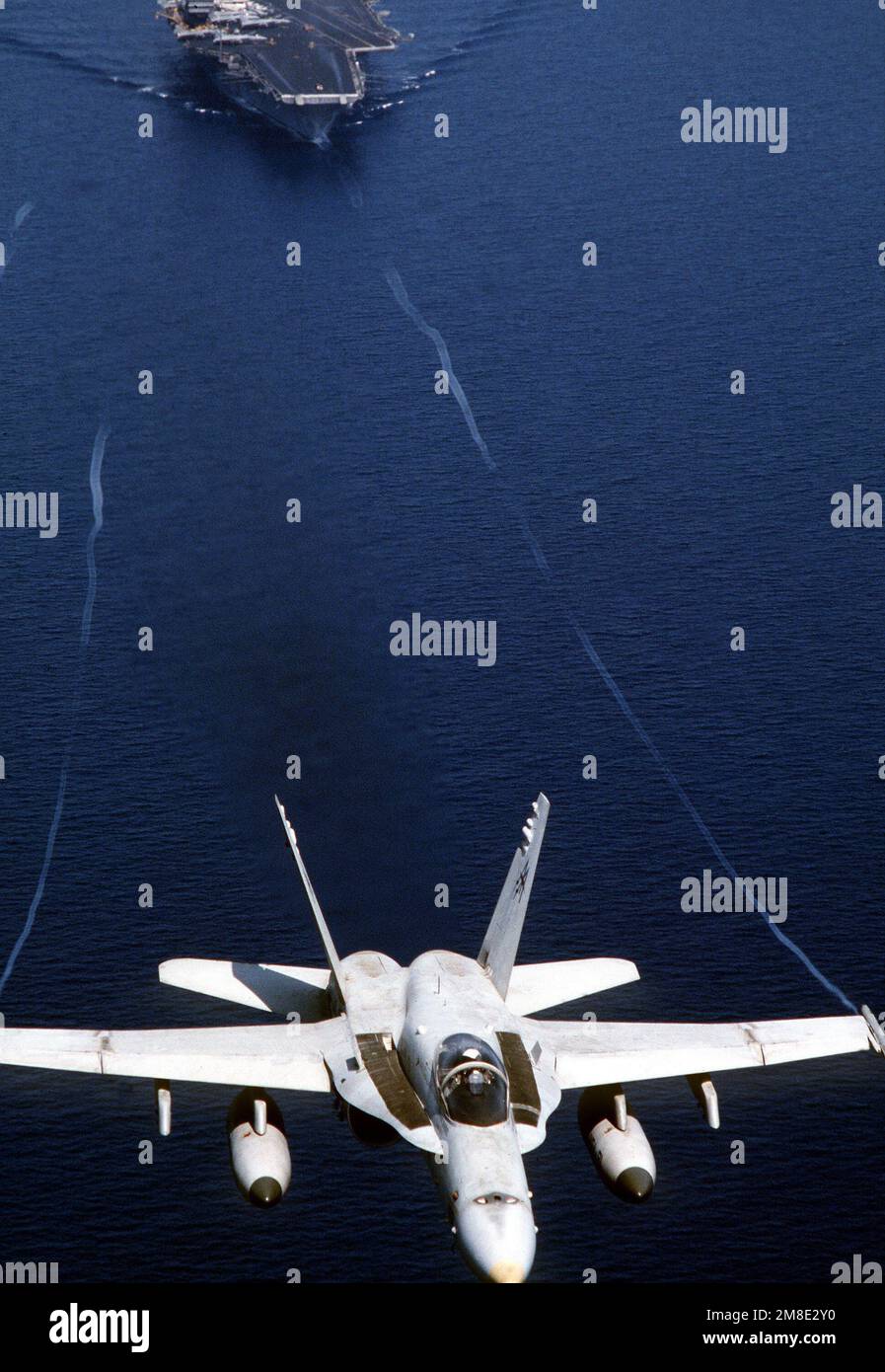 An aerial view of a F/A-18C Hornet aircraft of Strike Fighter Squadron ...