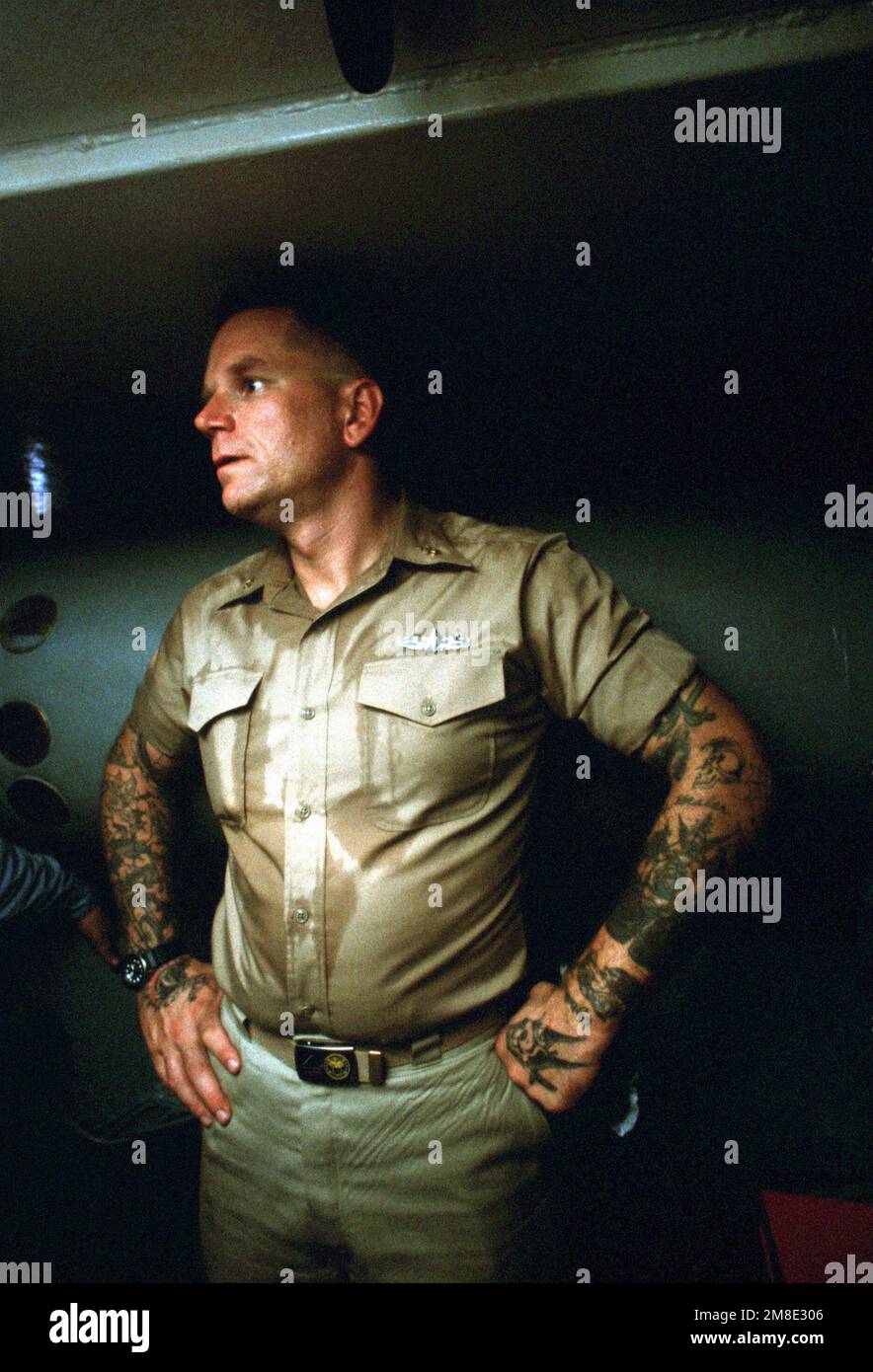 CHIEF PETTY Officer J.C. Miller talks to the members of his division ...