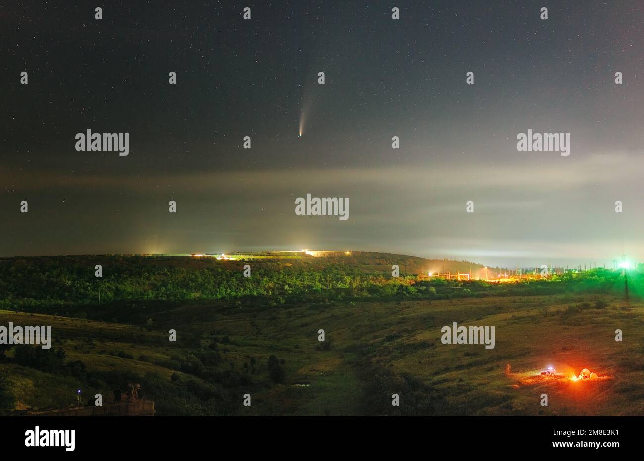 Night landscape at the nature. Astronomical photography of Neowise ...