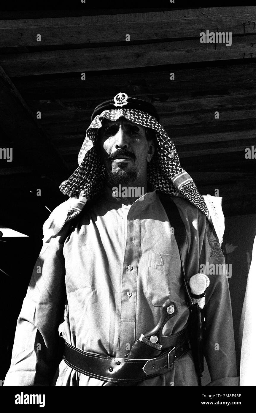 A member of the Saudi national guard stands outside a building during ...