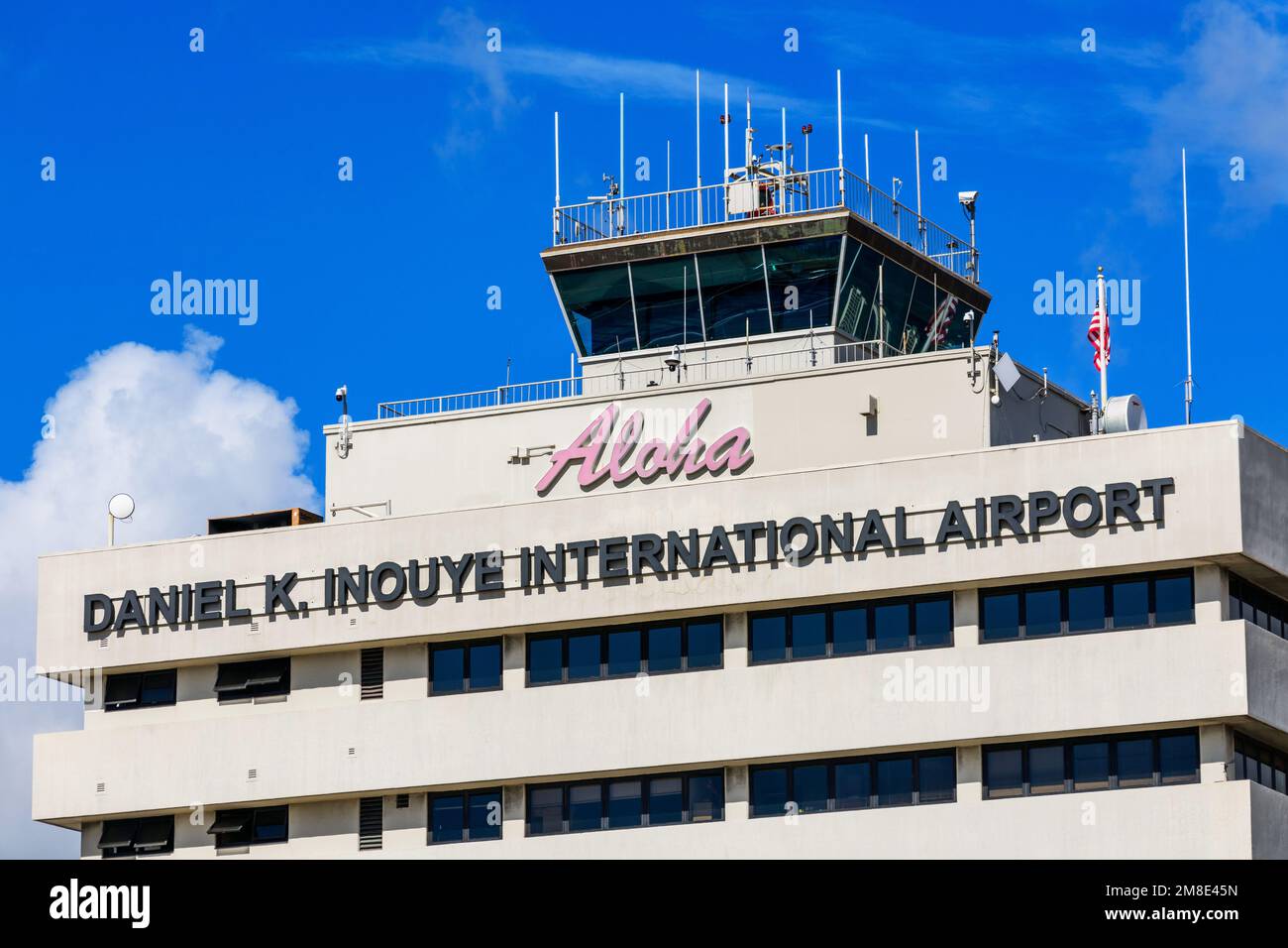 Daniel K. Inouye International Airport sign on building tower facade of ...