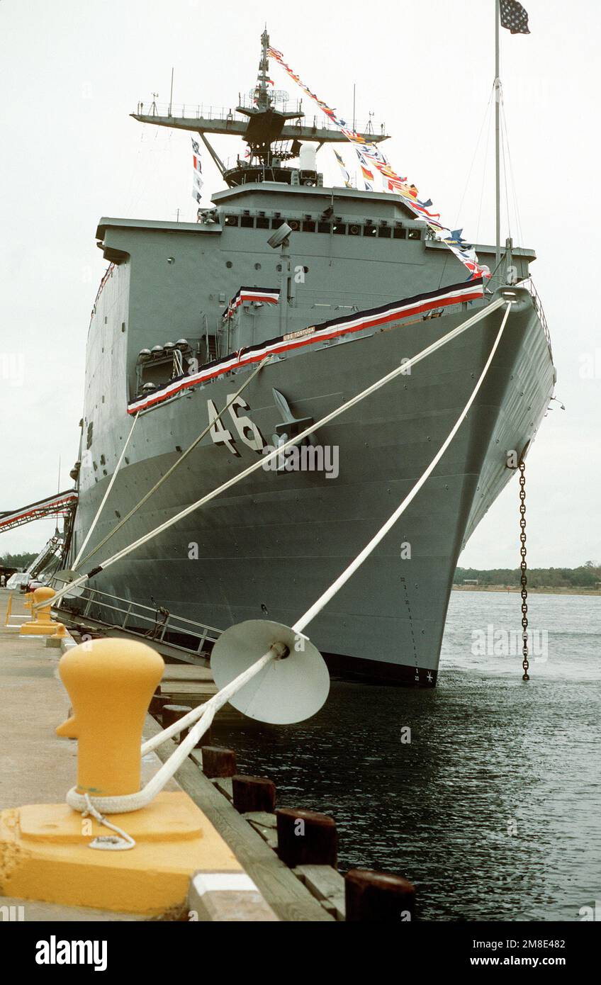 A starboard bow view of the dock landing ship USS TORTUGA (LSD 46) tied ...