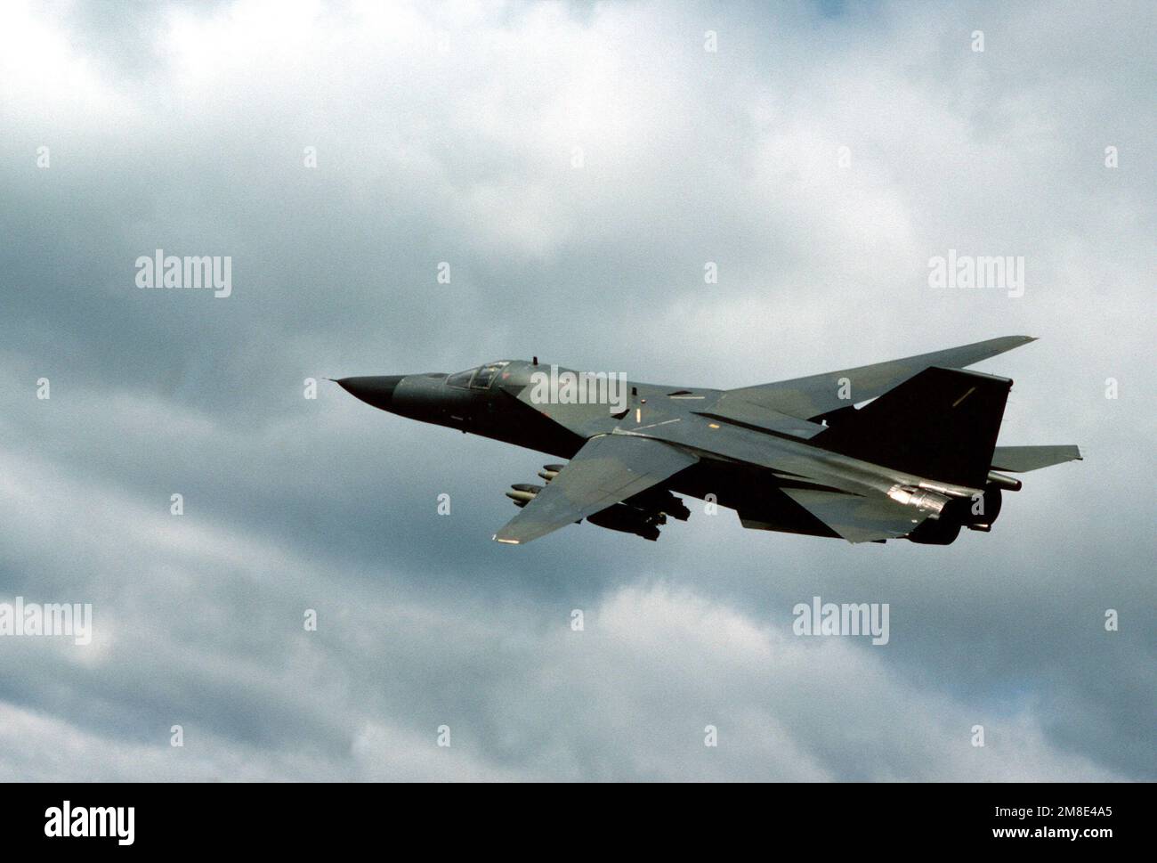 An air-to-air left side view of a 509th Bombardment Wing FB-111A ...