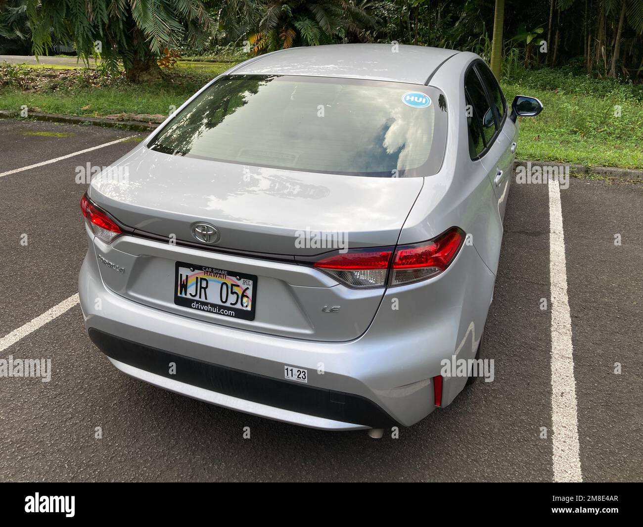 Toyota Corolla vehicle with Hui sign, logo on the Hui car share service ...