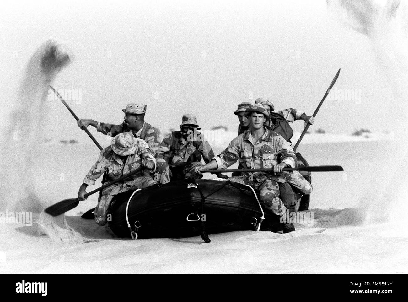 Marines from Company A, 1ST Reconnaissance Battalion, practice rowing ...