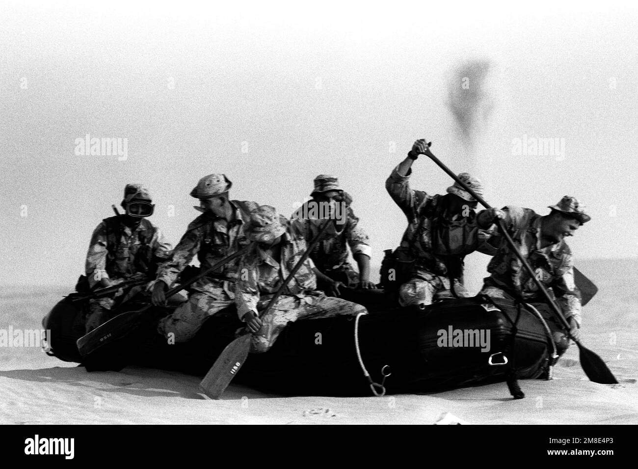 Marines from Company A, 1ST Reconnaissance Battalion, practice rowing ...