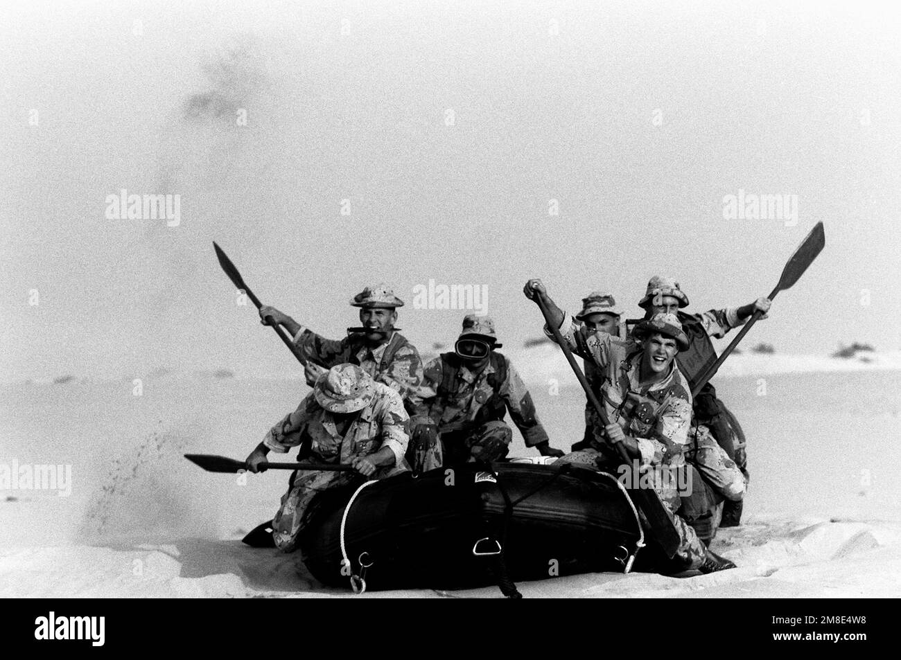 Marines from Company A, 1ST Reconnaissance Battalion, practice rowing ...
