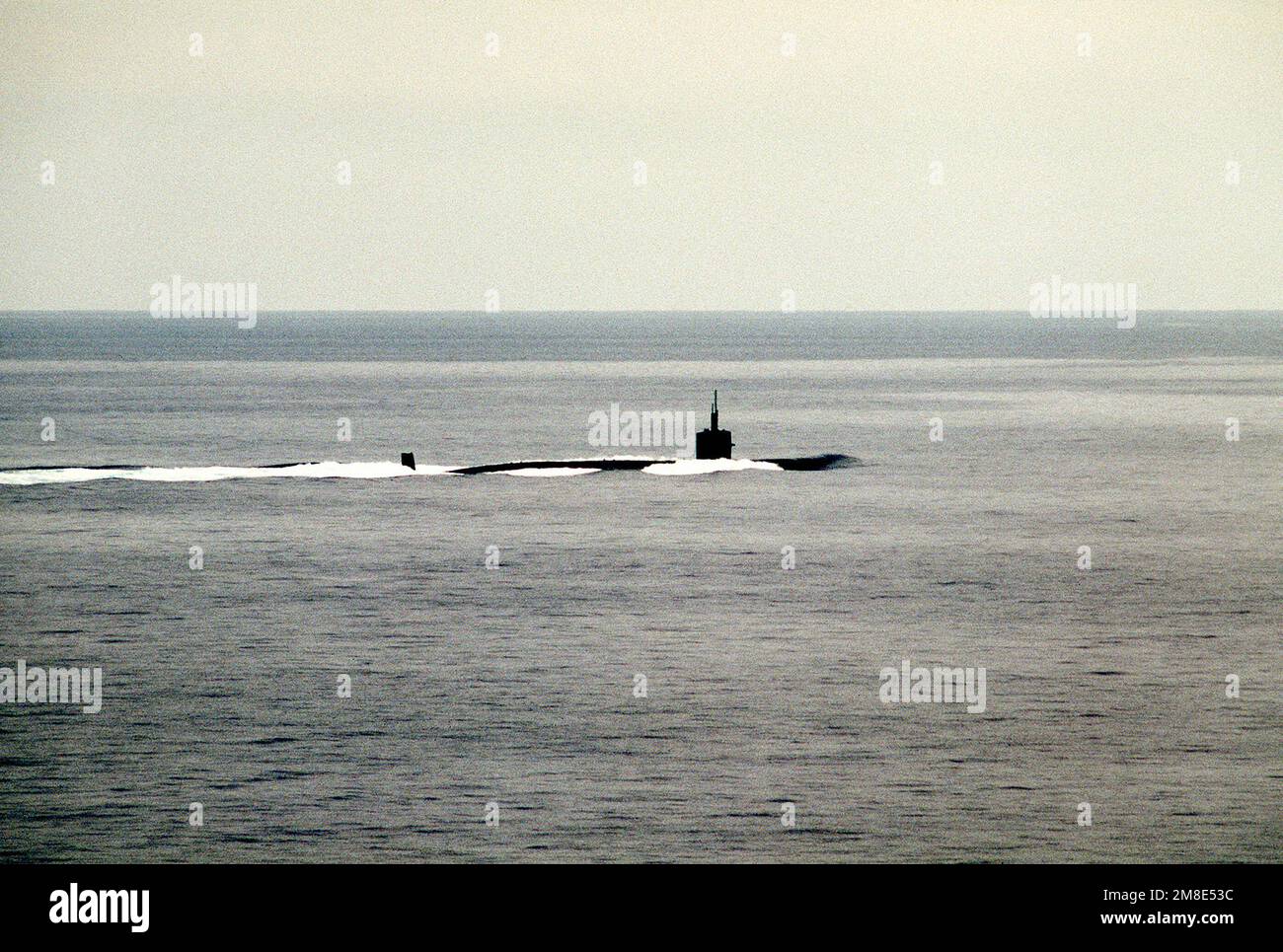 A starboard view of the nuclear-powered attack submarine USS ...