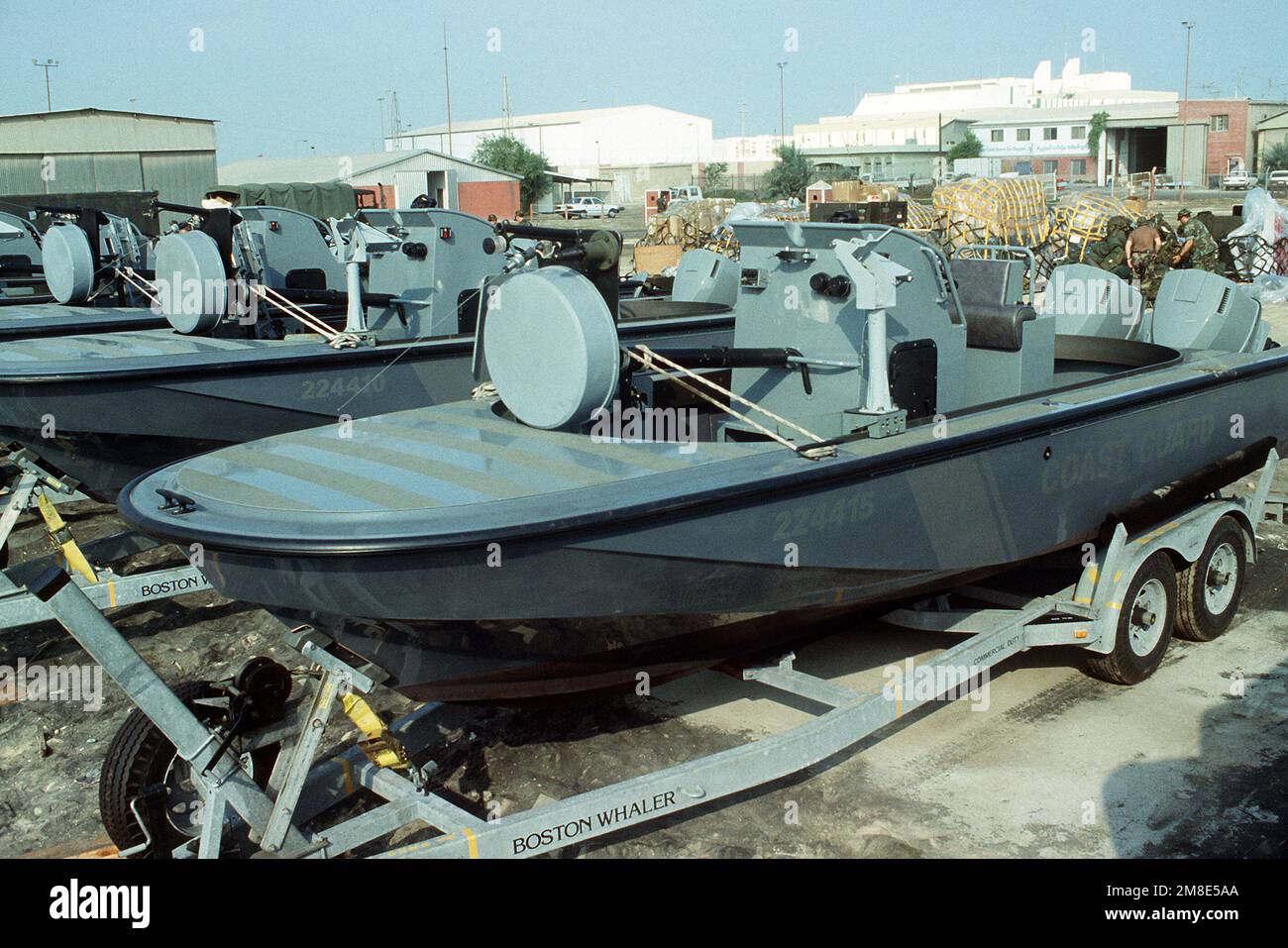 Raider port security boats line a port facility near the deployment ...