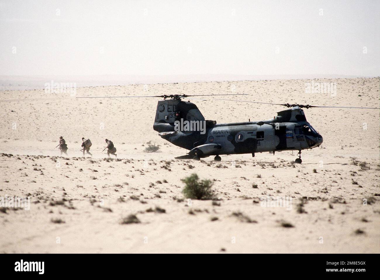 Marines of Co. C, 1ST Bn., 2nd Marine Div., move out on a mission after ...