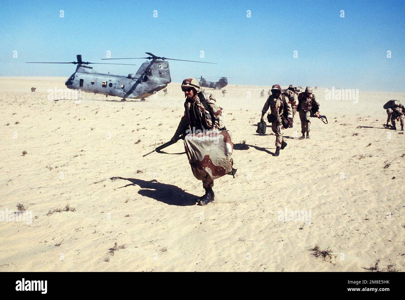 Marines of Co. C, 1ST Bn., 2nd Marine Div., move out on a mission after ...