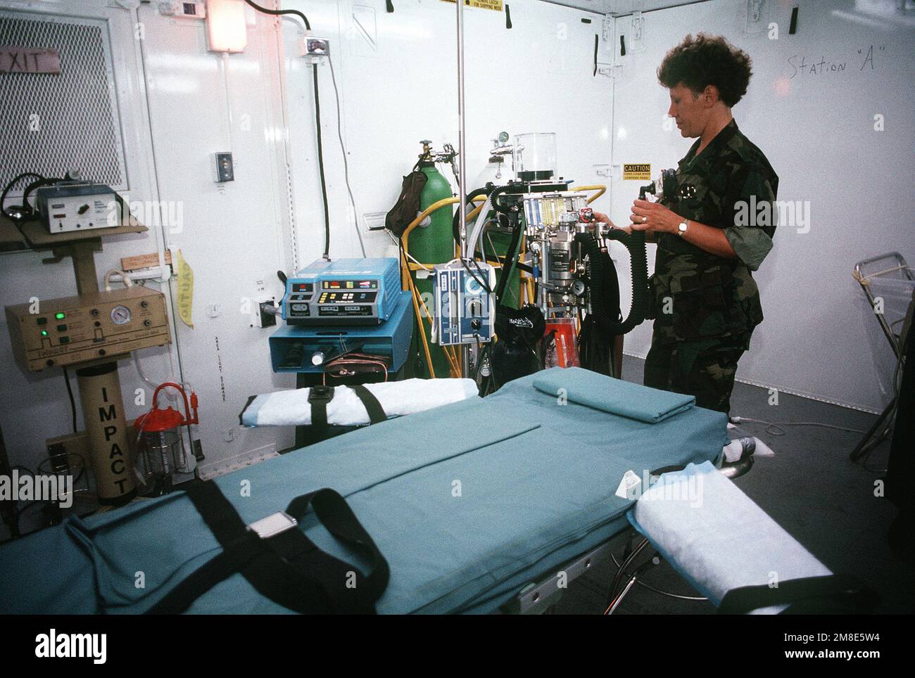 LT. Brenda Shealy of Fleet Hospital Five checks a piece of anesthesia ...