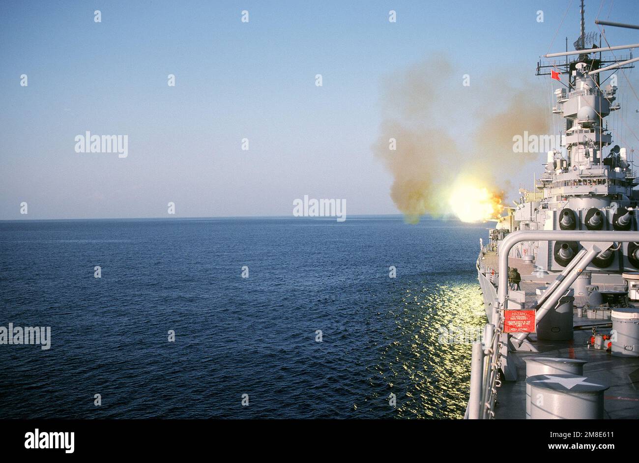 A projectile is fired off the starboard side from one of the Mark 38 5 ...