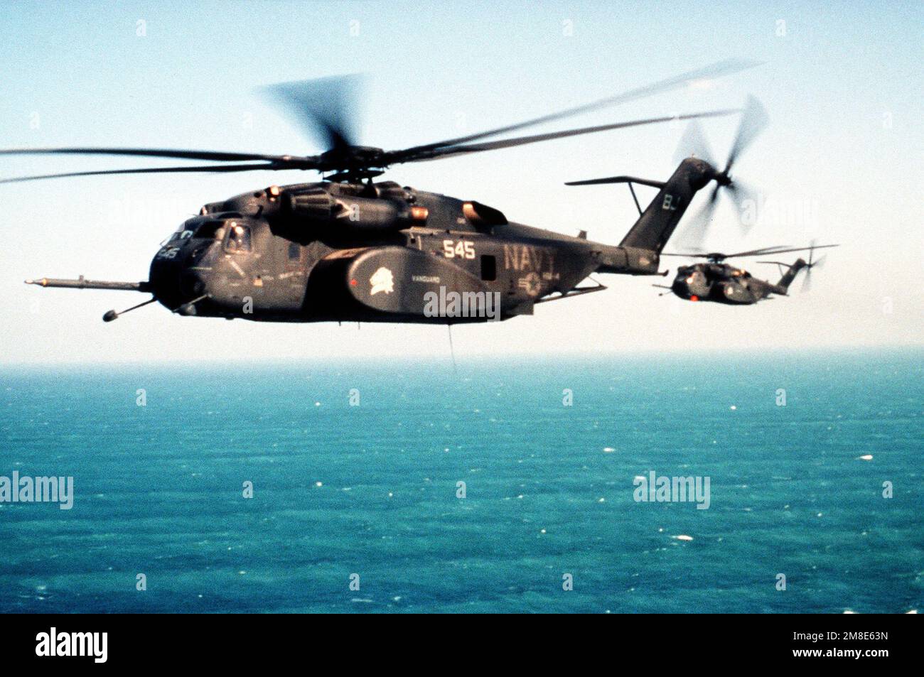 Two Helicopter Mine Countermeasures Squadron 14 (HM-14) MH-53E Sea ...