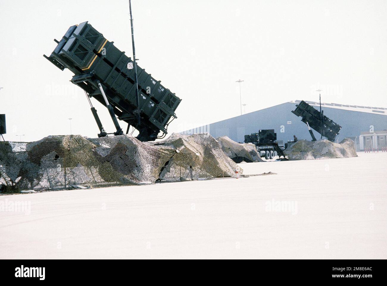A partially camouflaged M-109 launching station for the MIM-104 Patriot ...