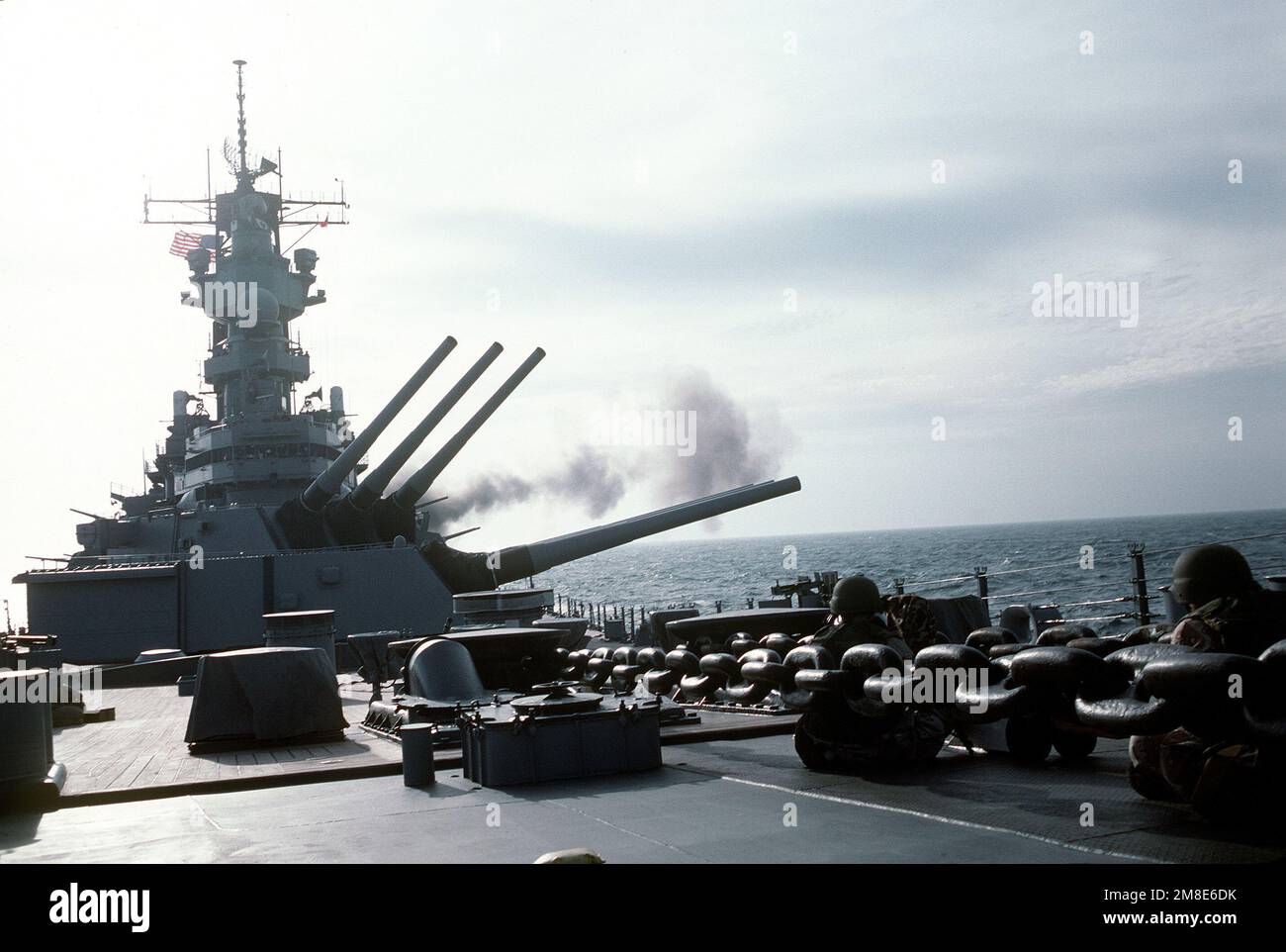 Smoke drifts away from the battleship USS WISCONSIN (BB-64) after the ...