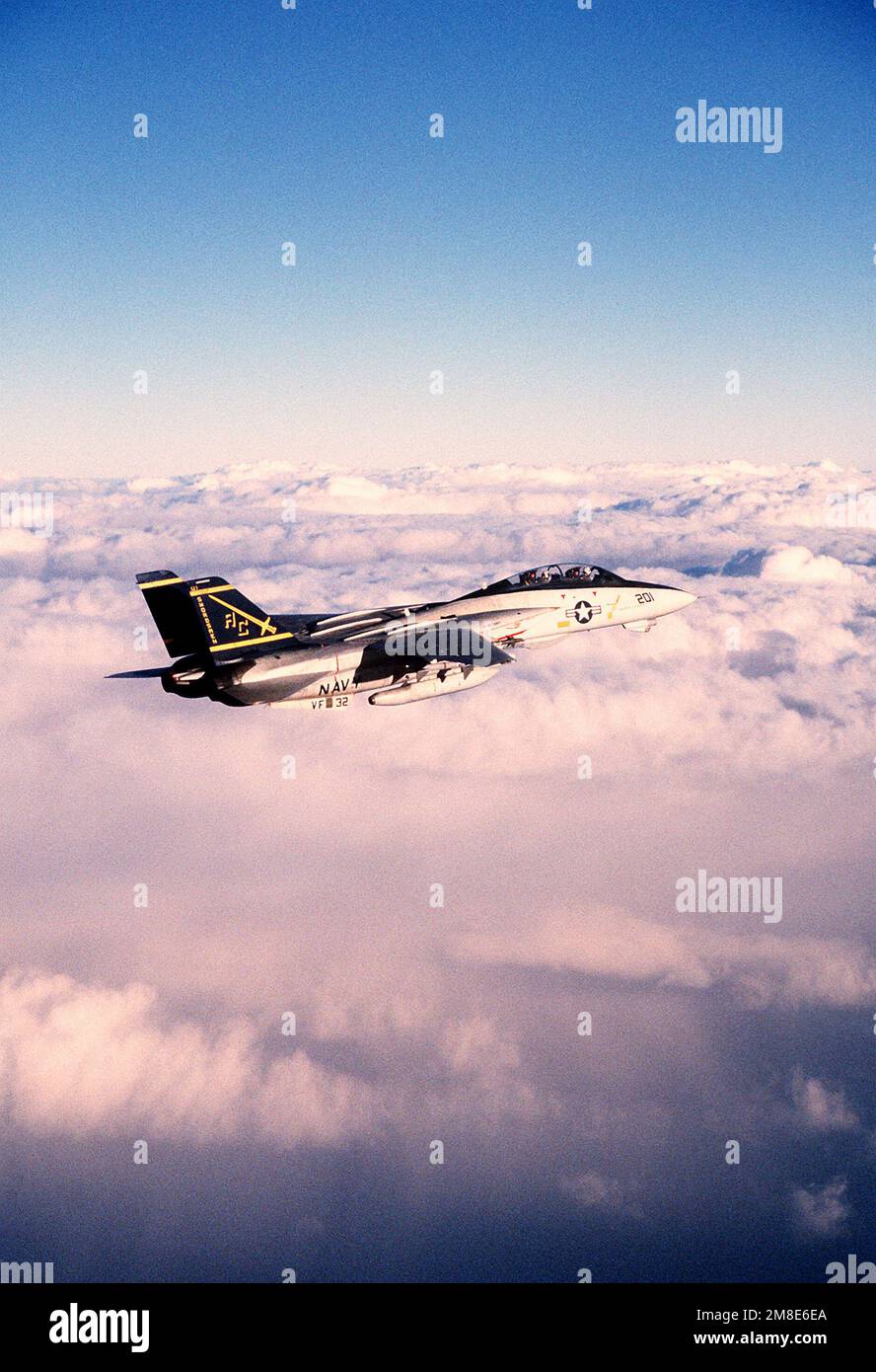 An air-to-air right side view of a Fighter Squadron 32 (VF-32) F-14A ...