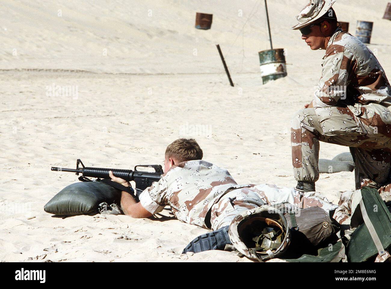 A Marine from 7th Platoon, 1ST Force Reconnaissance Company, fires his ...