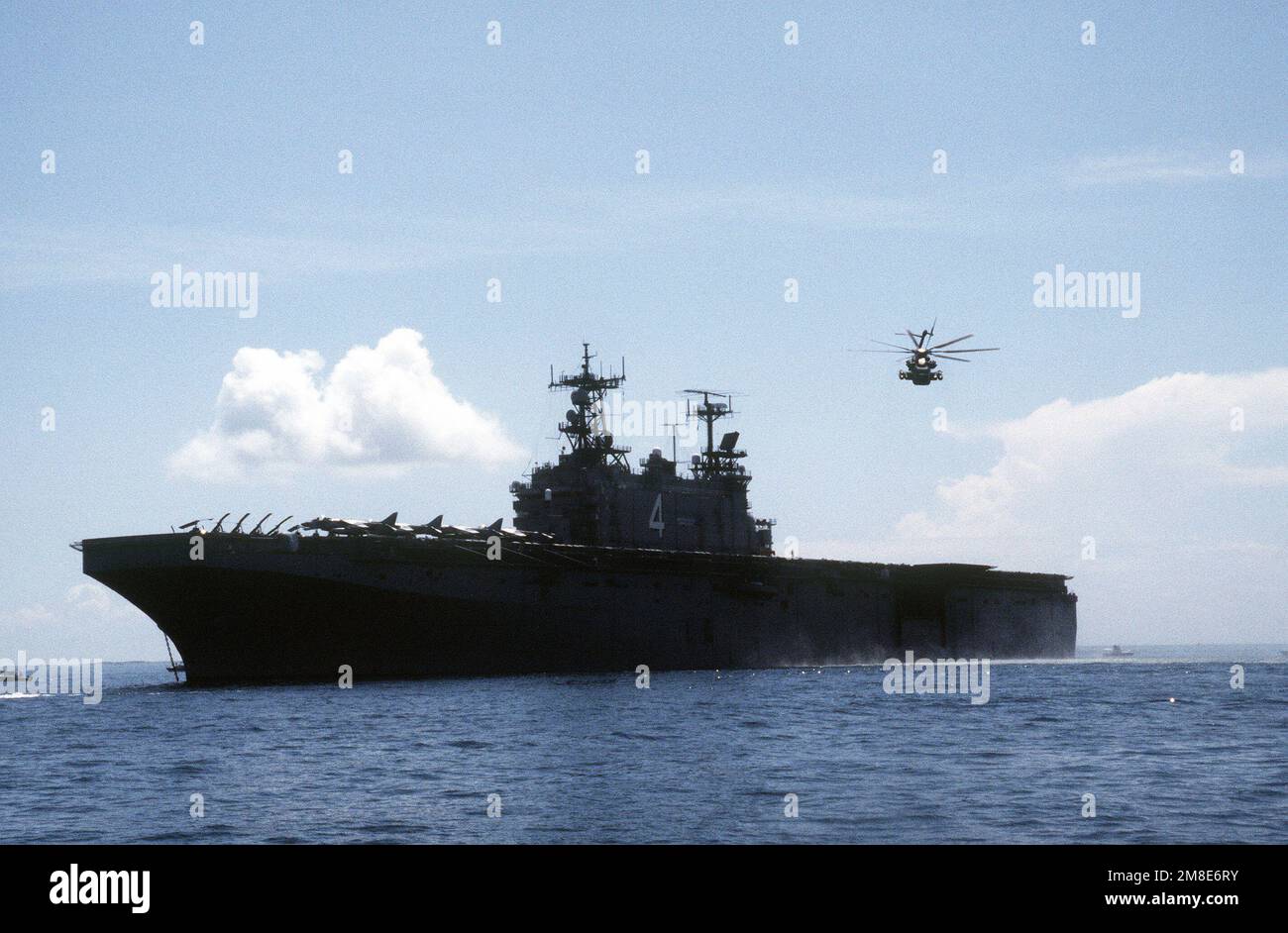 The amphibious assault ship USS NASSAU (LHA 4) lies at anchor prior to ...
