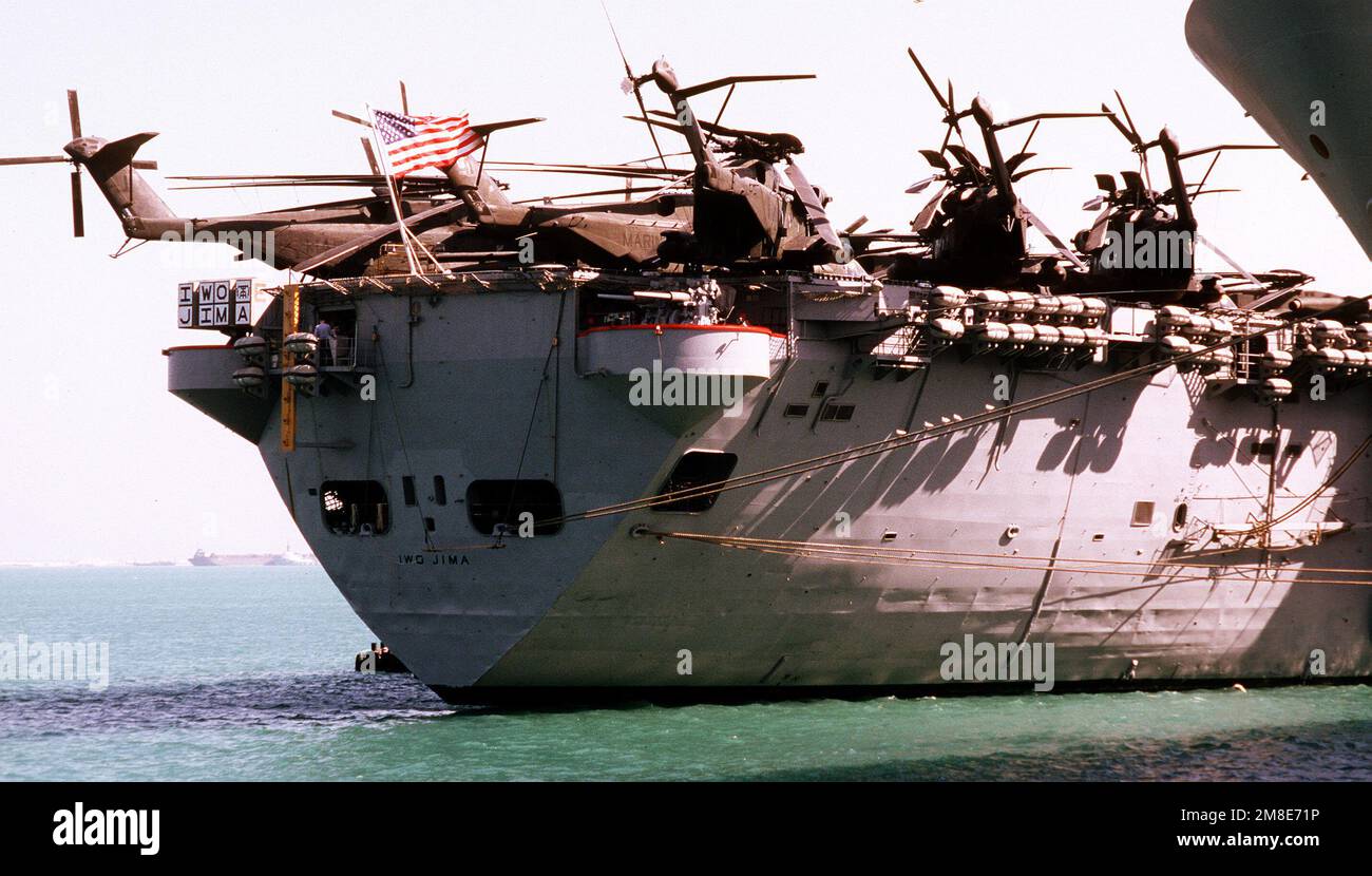 Marine CH-53E Super Stallion helicopters line the stern of the ...