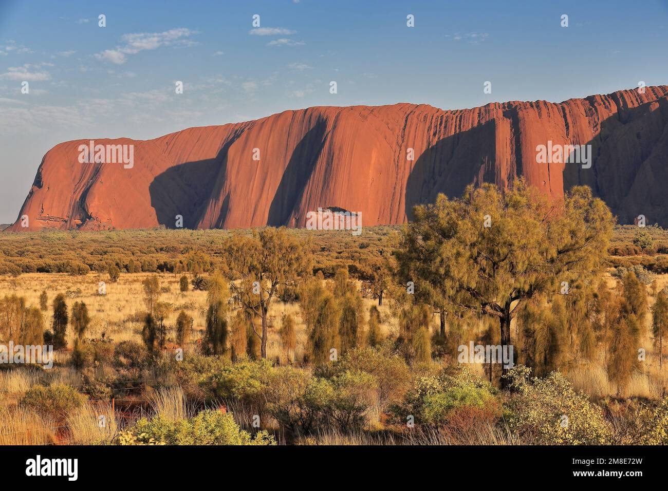 400 Partial view of Uluru-Ayers Rock in the early morning under an ...