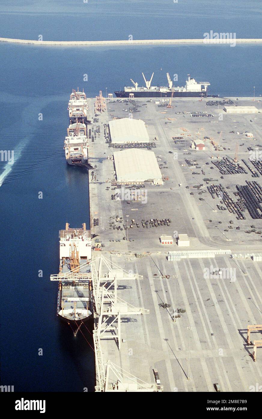Several vehicle cargo ships of Maritime Pre-positioning Ship Squadron 1 ...