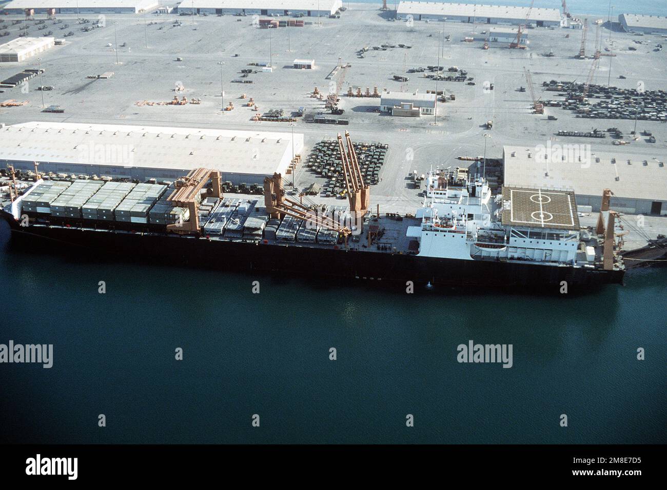 The vehicle cargo ship SGT. MATEJ KOCAK (T-AK-3005) offloads cargo ...