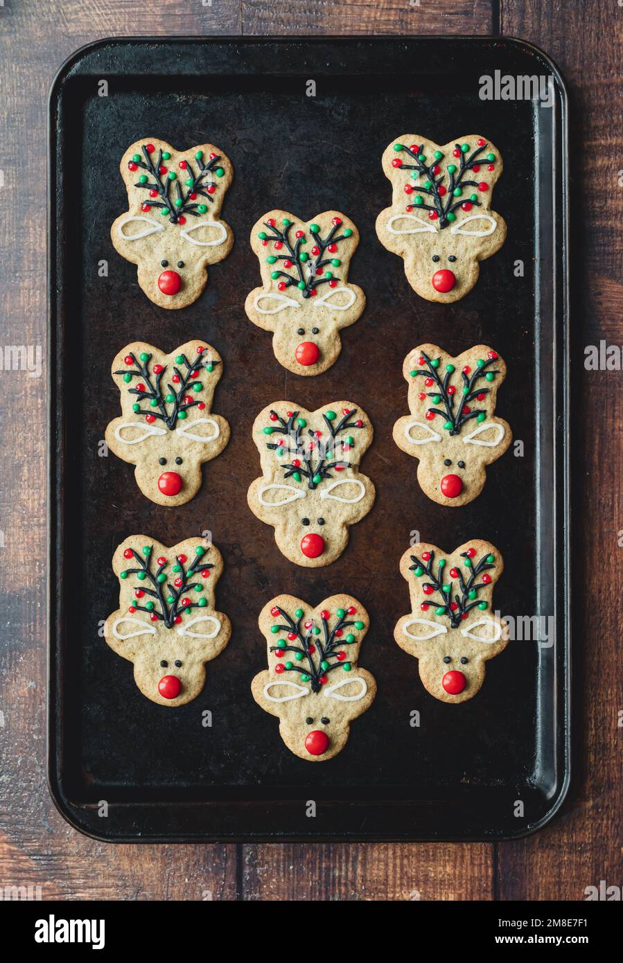 Baking tray of reindeer shaped gingerbread cookies for christmas Stock ...