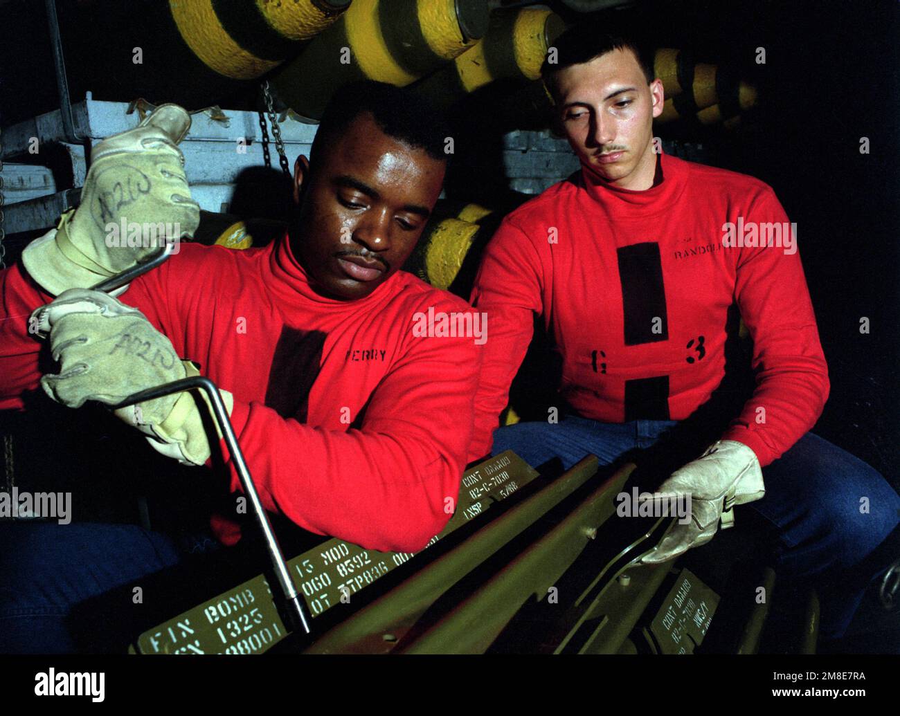 Aviation Ordnanceman AIRMAN (AOAN) Raymond Perry, left, and AOAN ...