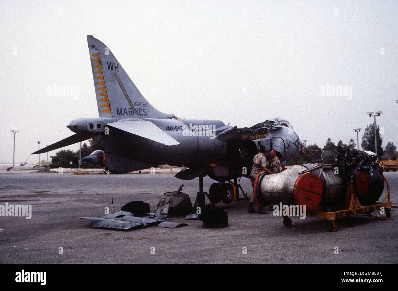 Aviation personnel from the Marine Wing Support Squadron 174, repair an ...