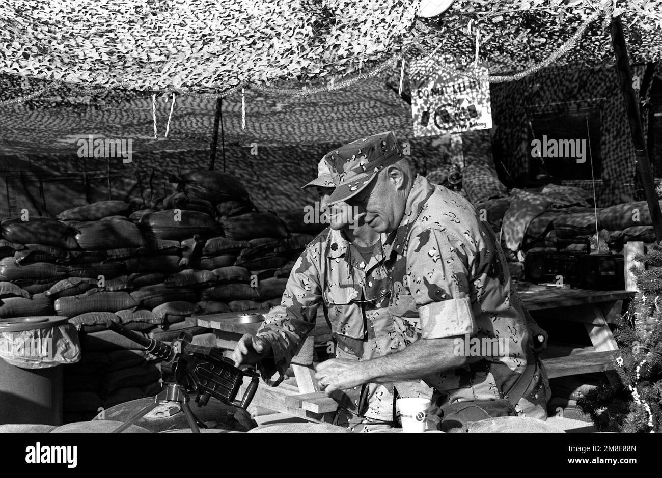 An officer shows GEN. Alfred M. Gray, commandant of the Marine Corps, a ...