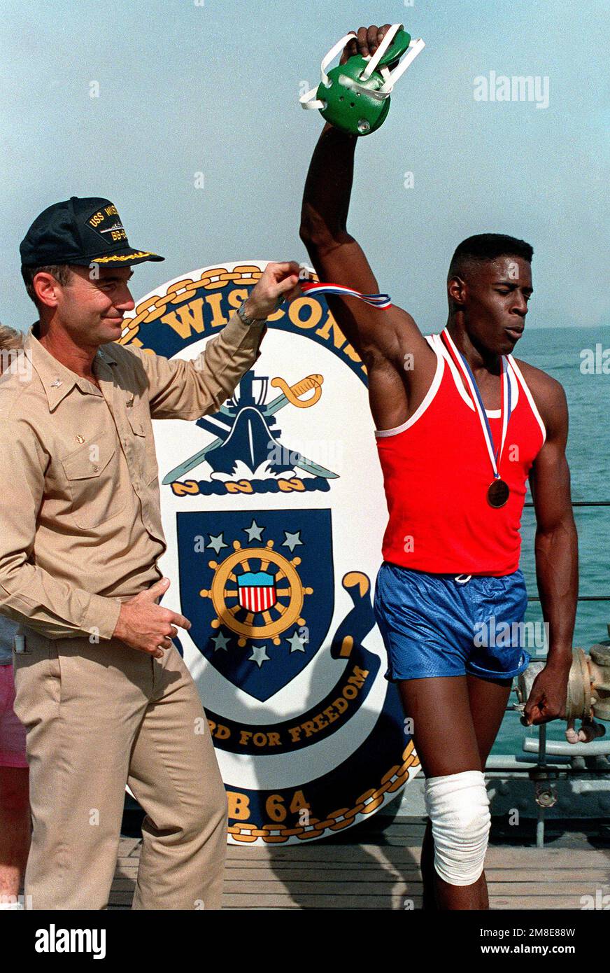 Captain D. S. Bill, Commanding Officer of the battleship USS WISCONSIN ...