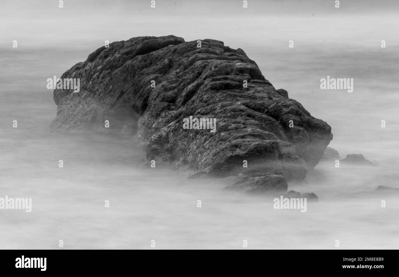 Rocky beach waves in Black and White Stock Photos & Images - Alamy
