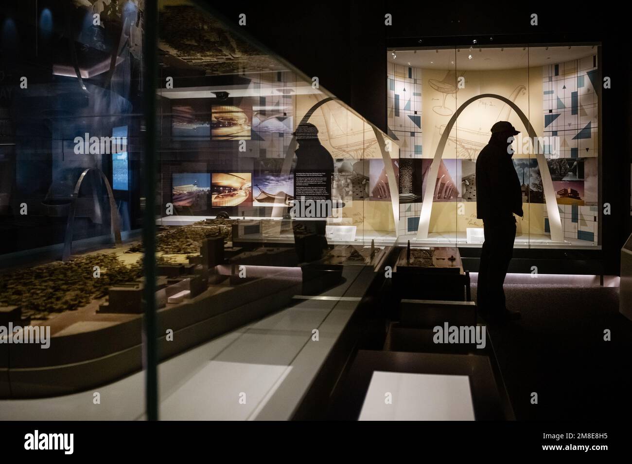 Man viewing exhibit in Gateway Arch museum Stock Photo - Alamy