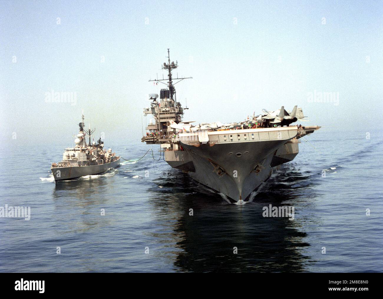 A bow view of the aircraft carrier USS RANGER (CV-61) conducting an ...
