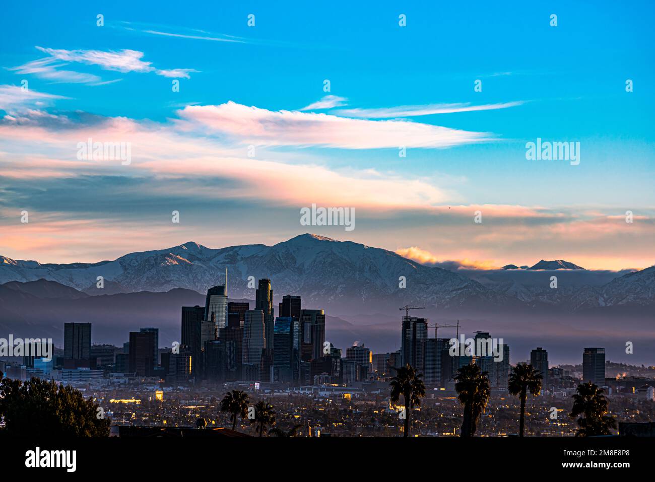Snow Capped Mountains Sit Behind Los Angeles Skyline Stock Photo - Alamy