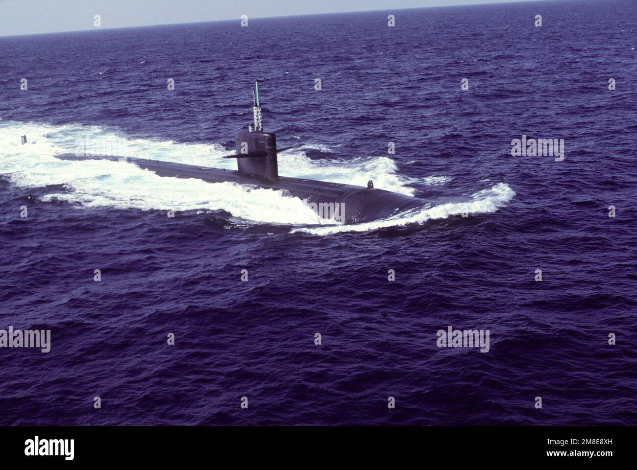 A starboard bow view of the nuclear-powered attack submarine USS ...