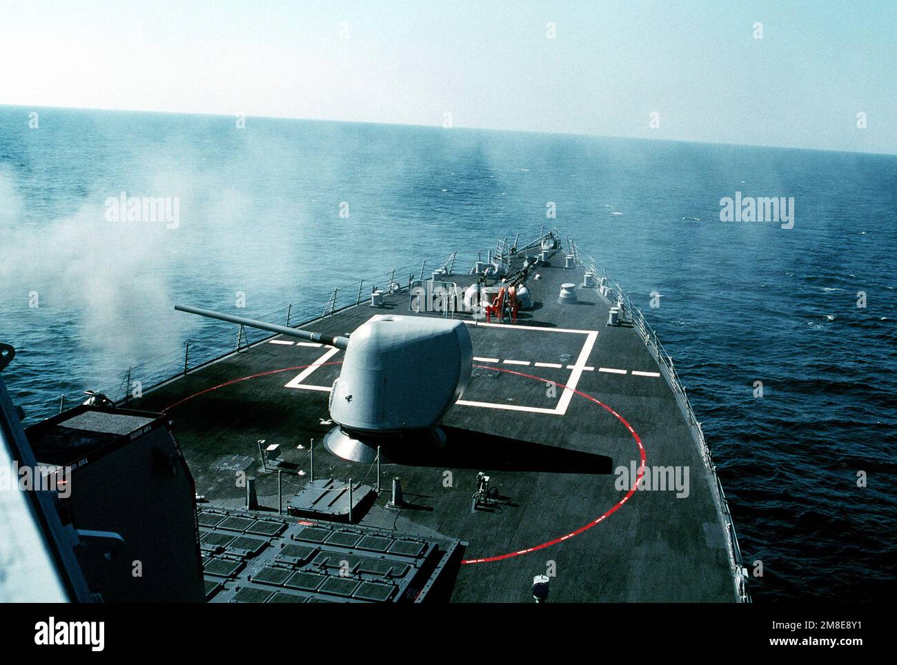 The 5-inch/54-caliber gun near the bow of the guided missile destroyer ...