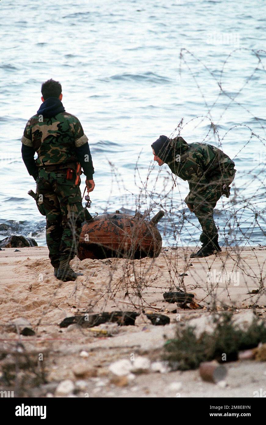 Two members of Explosive Ordnance Disposal (EOD) Detachment Mobile Unit ...